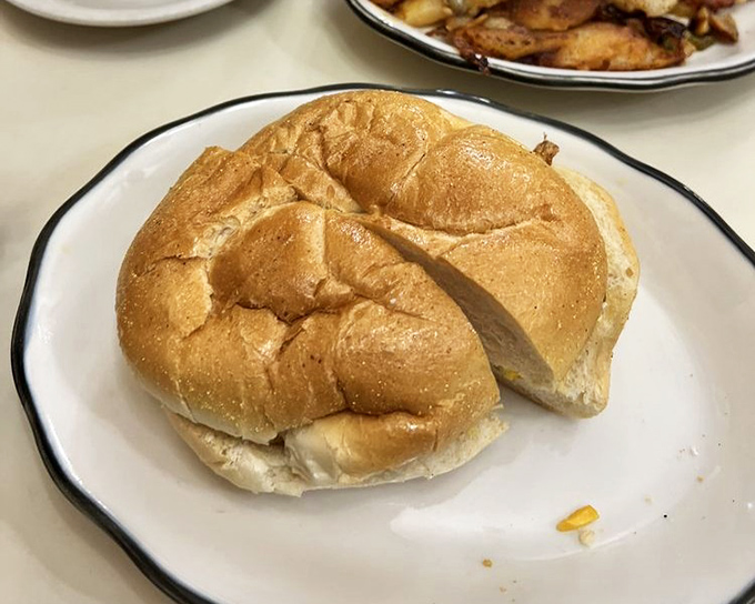 Sometimes happiness is as simple as a fresh roll waiting to embrace whatever delicious filling you've ordered. Anticipation on a plate.