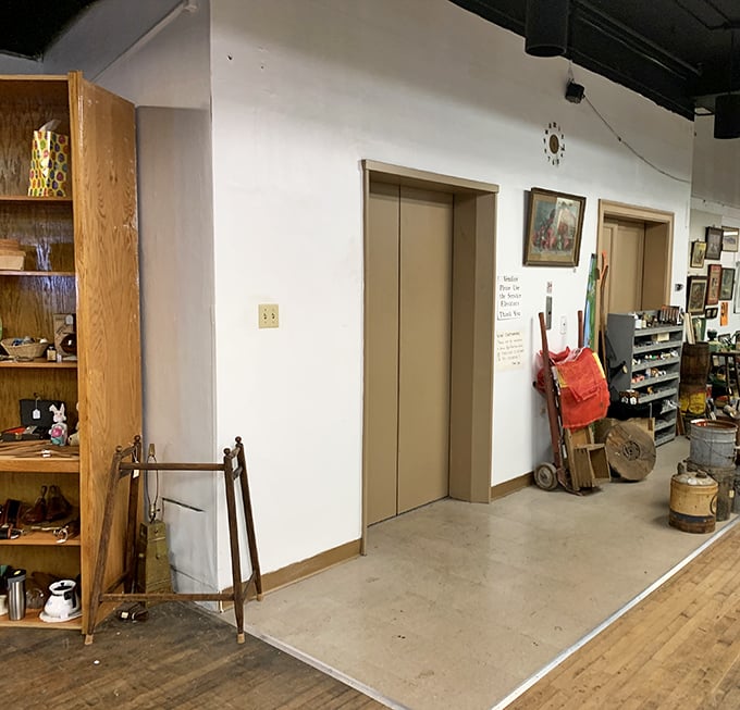 Even the elevators feel vintage here. Those cream-colored doors have opened to reveal countless treasures being transported between floors.