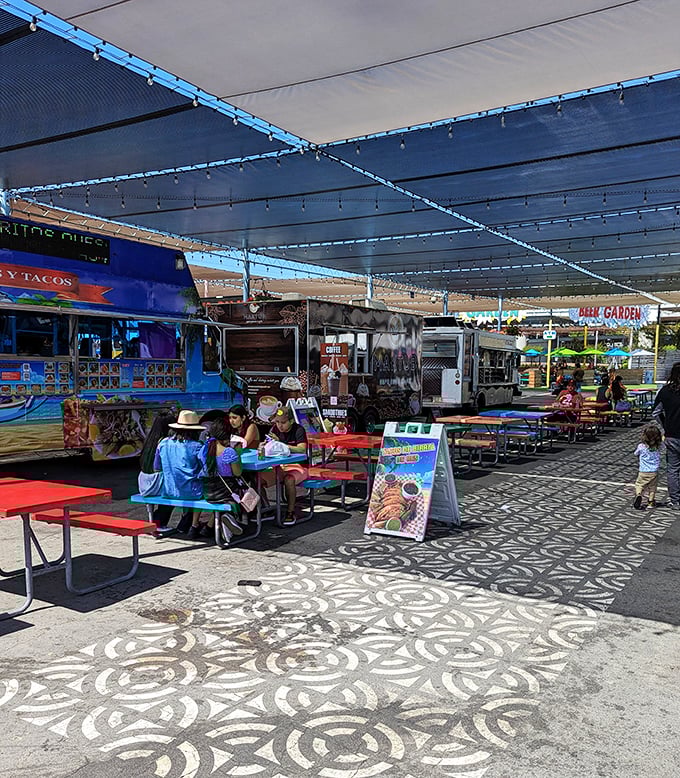 Food trucks line up like a mobile feast, bringing authentic flavors to hungry bargain hunters.