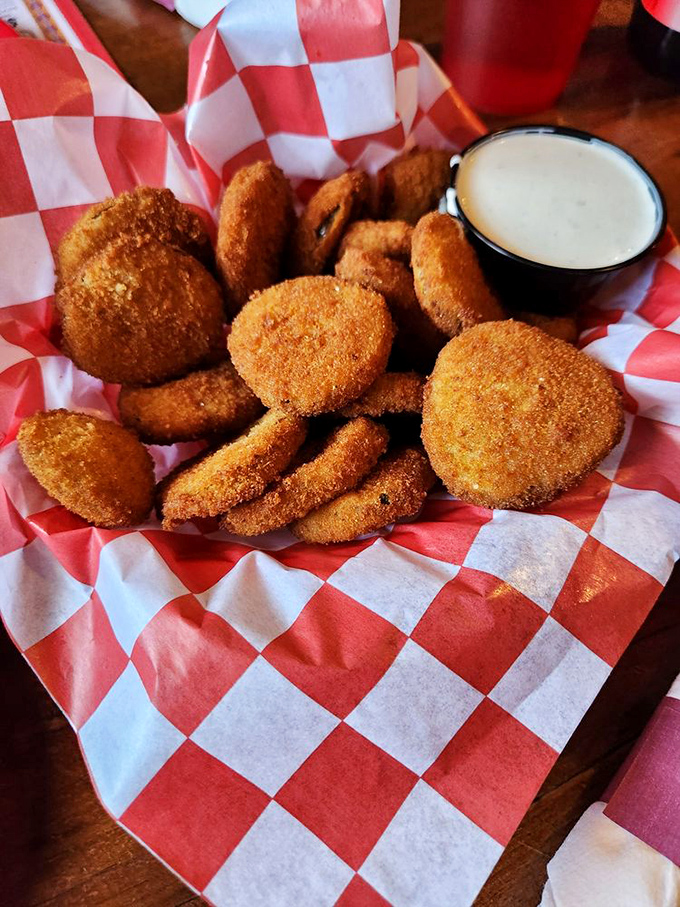 Pickle spears wearing golden jackets of crispy batter. The perfect tangy counterpoint to all that chicken&mdash;and addictive in their own right.