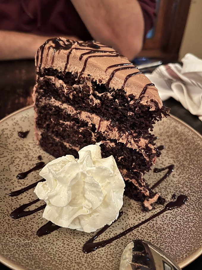 Chocolate cake so decadent it should require a permission slip. Three layers of cocoa bliss prove that Pennsylvania understands dessert diplomacy.