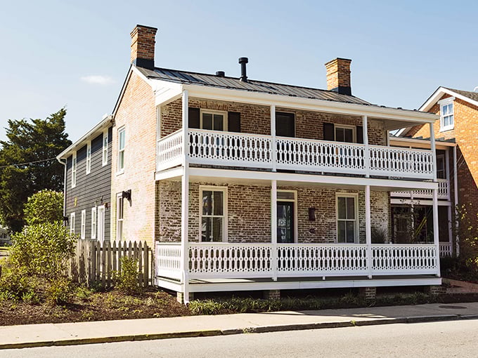 This historic brick building with its double-decker porches has witnessed centuries of Chesapeake Bay life&mdash;if only those white railings could talk.