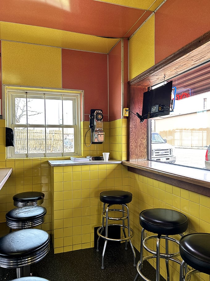 Yellow tiles and chrome stools&mdash;not designed by an influencer, but by generations of people who understand comfort.