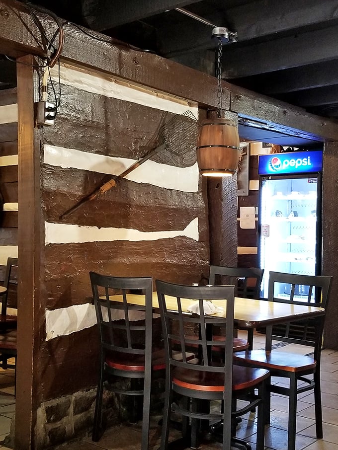 Exposed log walls and barrel lighting fixtures&mdash;because your chicken fried steak tastes better with a side of Kentucky heritage.
