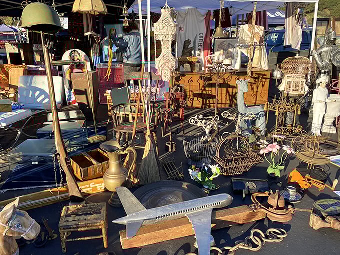 A beautiful chaos of vintage treasures. That brass lamp in the corner? It's already calling your name.