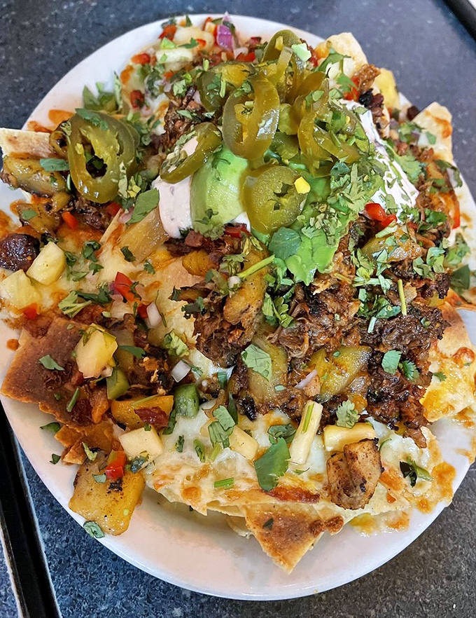 Nachos that refuse to be an appetizer &ndash; this mountain of toppings, cheese, and jalape&ntilde;os demands to be the main event.