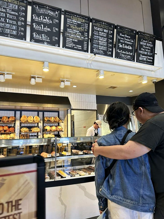 The ordering counter: where decision paralysis meets the gentle pressure of the line behind you, creating a uniquely delicious anxiety.