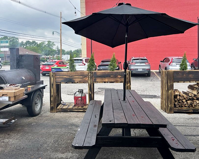 The outdoor setup proves great barbecue doesn't need fancy surroundings&mdash;just wood, fire, smoke, and someone who knows what they're doing.