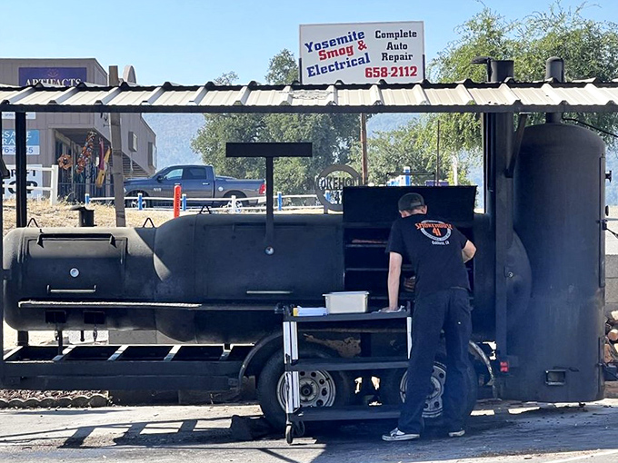 The source of all that smoky magic&mdash;a serious offset smoker that's seen more all-nighters than a college student during finals week.