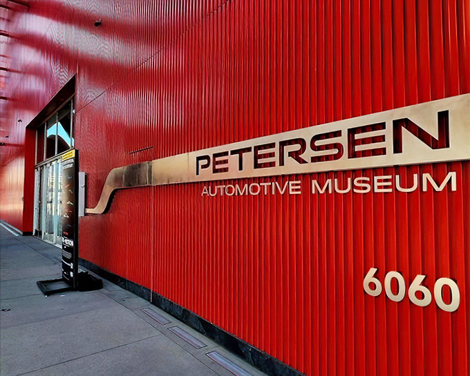 That crimson exterior with the museum's name emblazoned across it&mdash;automotive Mecca announcing itself to Wilshire Boulevard pilgrims.