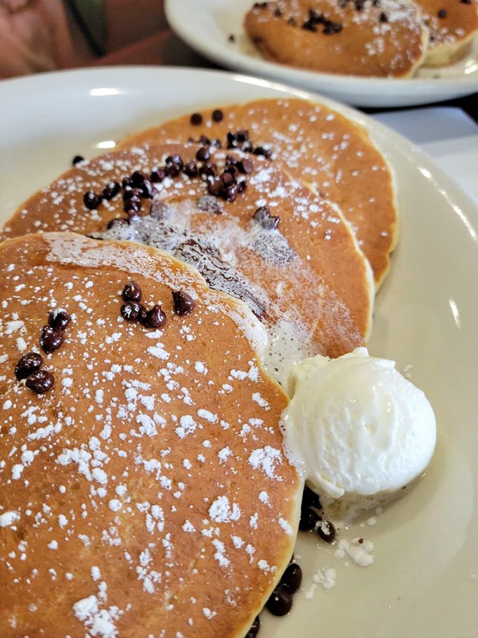 Pancakes that deserve their own ZIP code. Chocolate chips and powdered sugar create breakfast's answer to dessert.