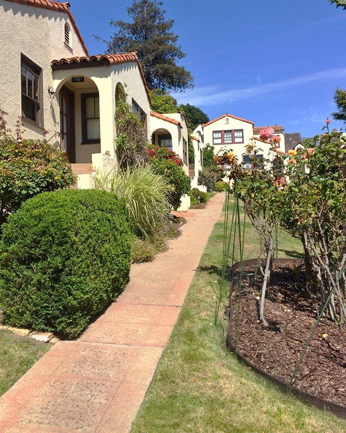 Spanish-style homes line peaceful walkways where the biggest traffic jam involves friendly neighborhood cats.