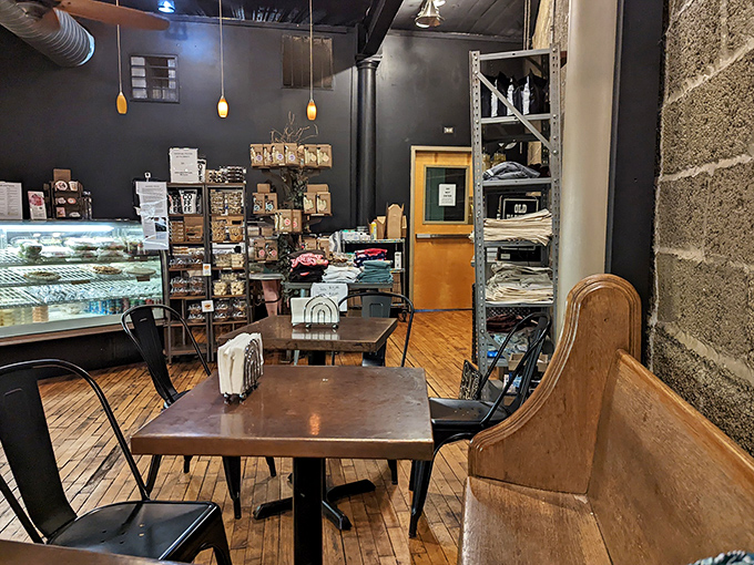 Rustic charm meets sweet comfort in this seating area where wooden tables have witnessed countless sugar-induced epiphanies.