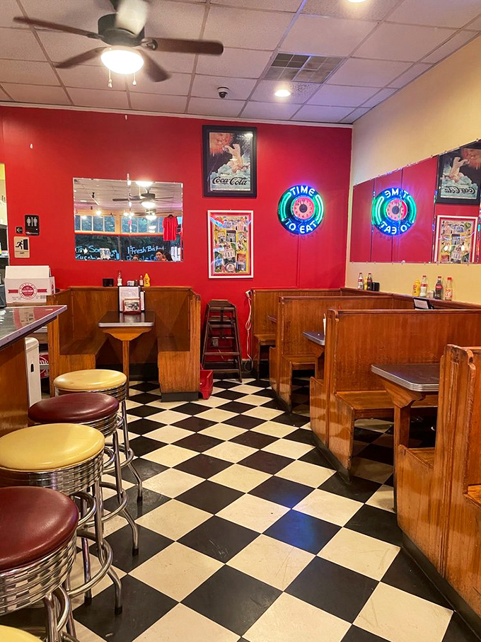 Red walls and wooden booths create the perfect backdrop for conversations that meander pleasantly between bites of comfort food classics.