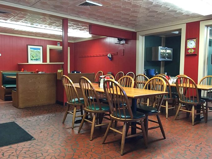 Red walls and wooden chairs create the perfect stage for barbecue bliss. No pretension, just a place where memories are made.