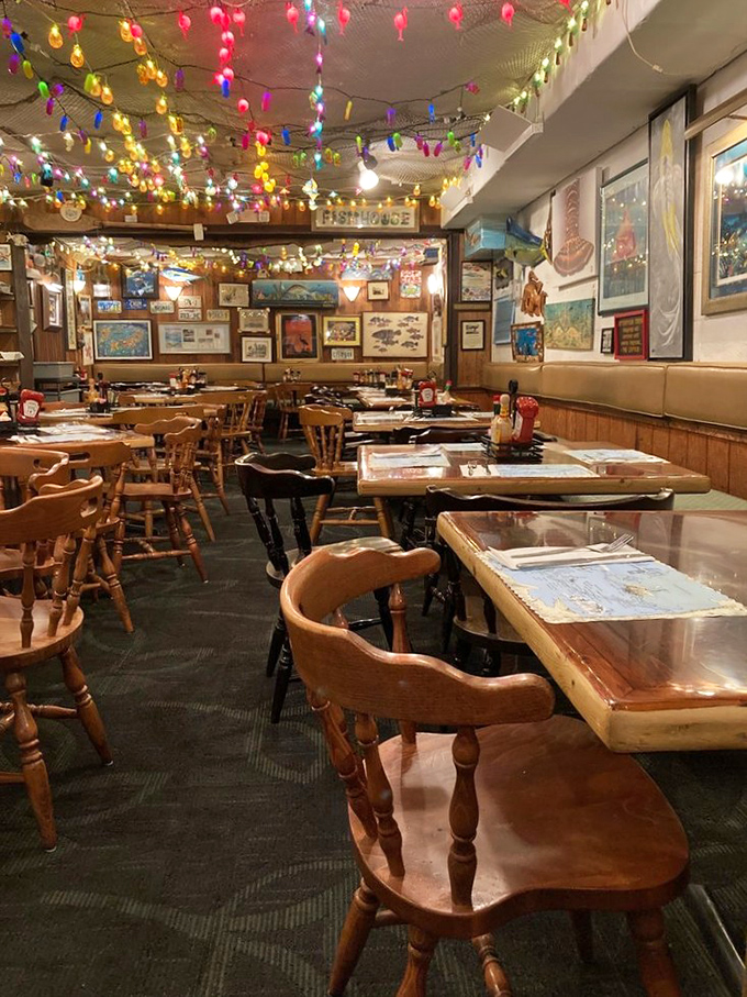 Wooden chairs that have supported countless happy diners, under a ceiling that's celebrating something 365 days a year.