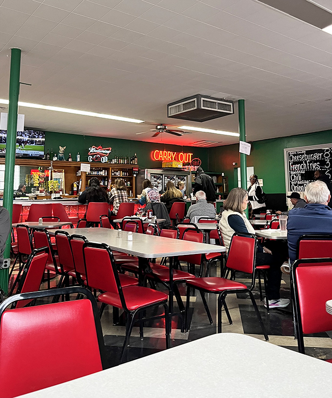A dining room where conversations flow as freely as the coffee. Those red chairs have supported generations of satisfied customers and countless food comas.