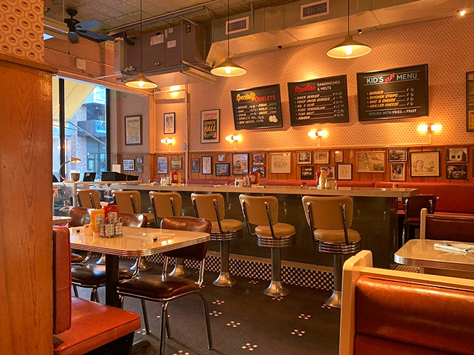 Counter seating: where solo diners become regulars and servers remember your order before you've even decided what you want.