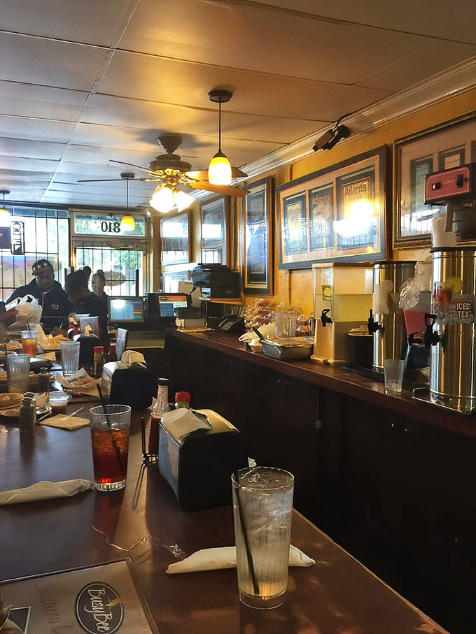 The counter where magic happens. Sweet tea flows like liquid sunshine while patrons eye each plate that emerges from the kitchen with unabashed desire.