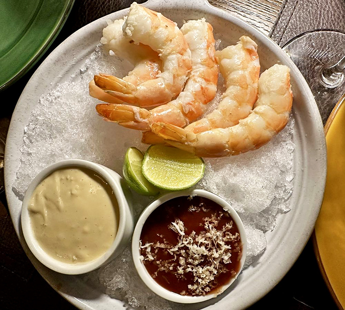 These jumbo shrimp are the supermodels of the seafood world—perfectly poised on ice, ready for their close-up with cocktail sauce.