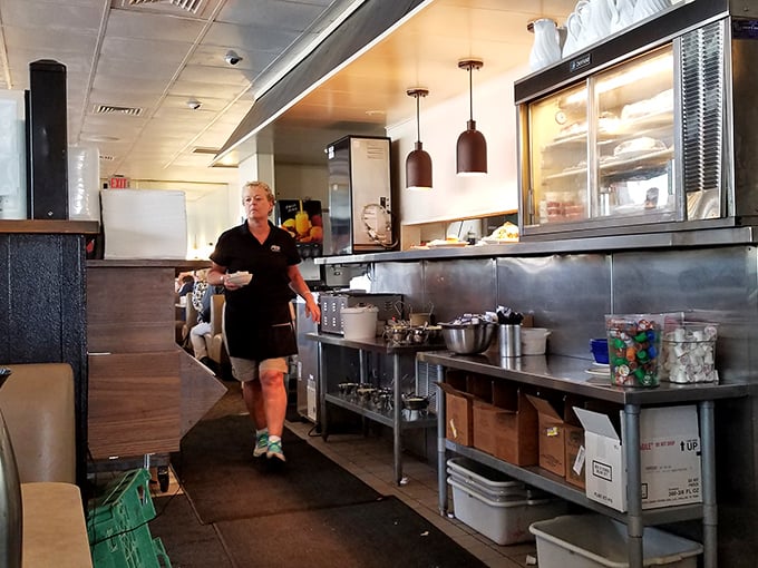 Behind every great pancake is a dedicated staff member, moving with the practiced efficiency of a breakfast ballet dancer.