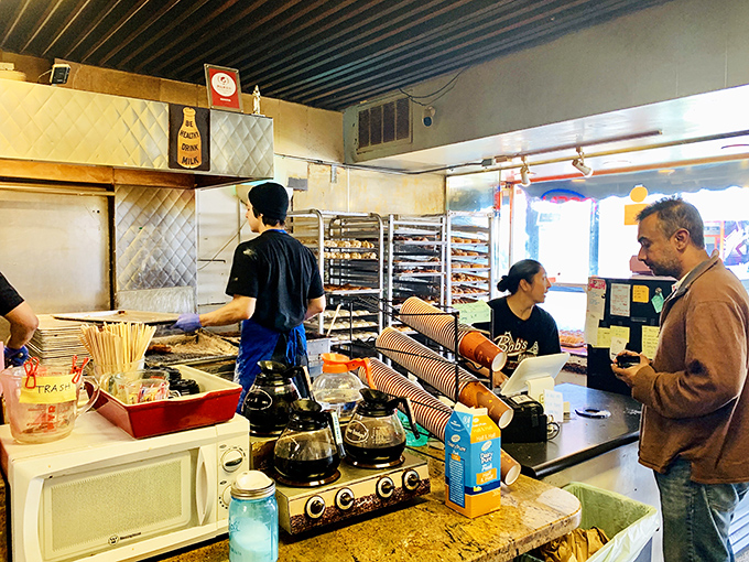 Behind the scenes, skilled hands work their magic, turning simple ingredients into neighborhood treasures and legends.