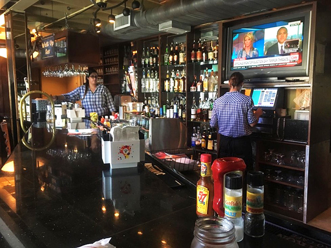 Friendly staff working behind the bar, ensuring every guest feels like treasured family.