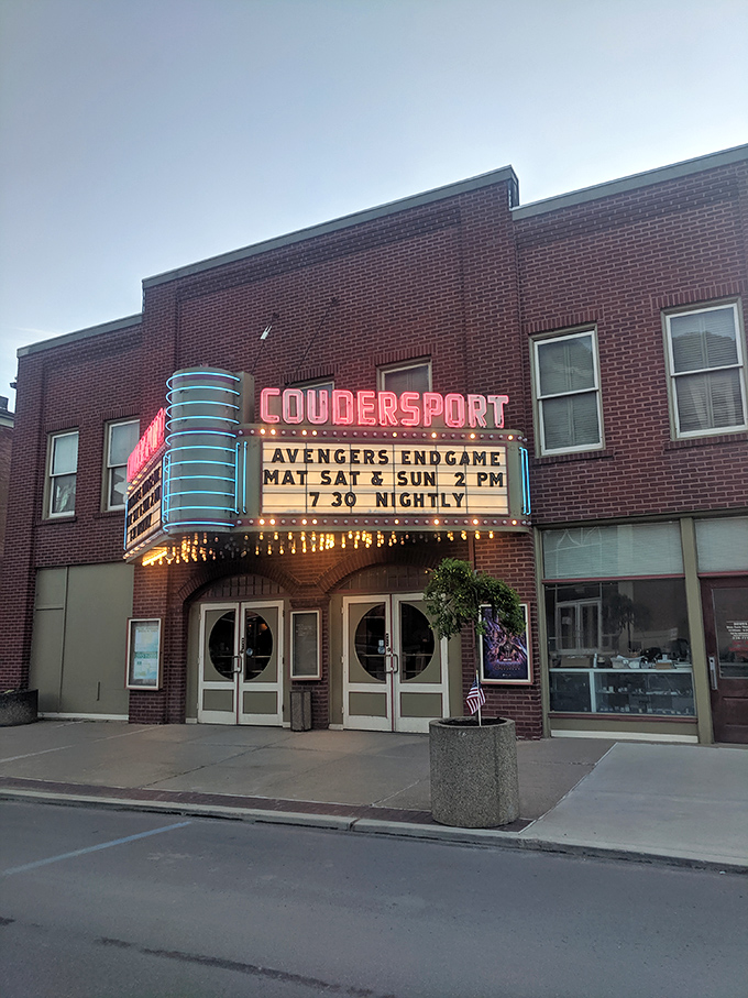 As dusk settles, the Coudersport Theatre's neon marquee glows like a beacon, promising a few hours of Hollywood magic in the heart of rural Pennsylvania.