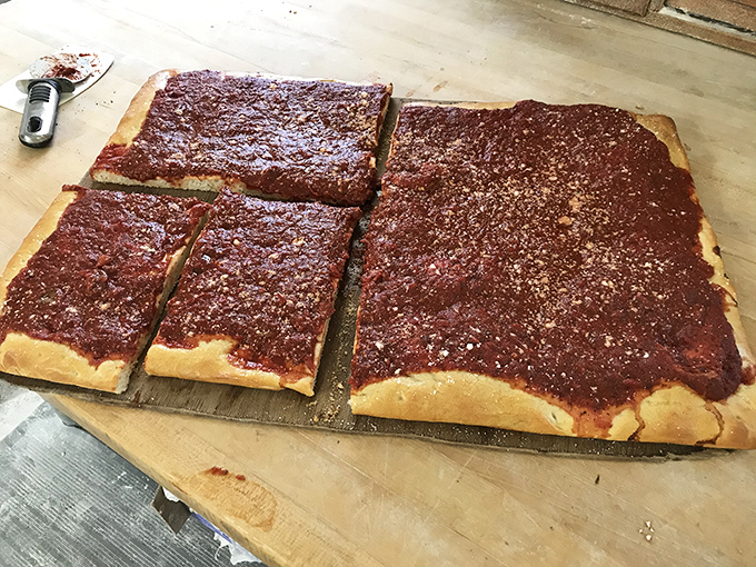 Tomato pie that makes you question why you've wasted time on regular pizza. This is the sauce-forward revelation you didn't know you needed.