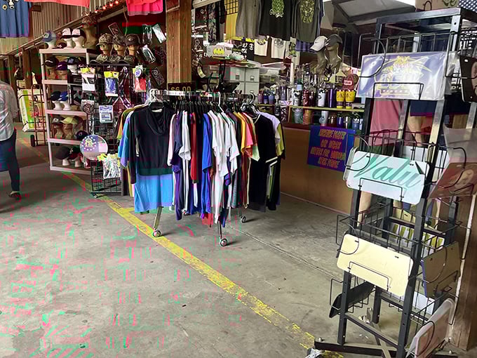 Retail therapy, flea market style! Racks of colorful clothing and shelves of miscellaneous goods create the ultimate low-pressure shopping experience.