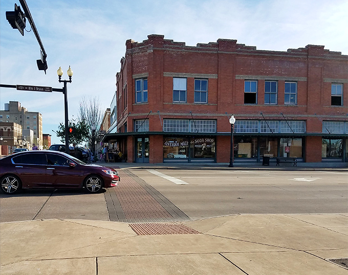Corner of Time's historic brick building stands like a time capsule on Bryan Avenue. Downtown charm with vintage treasures inside!
