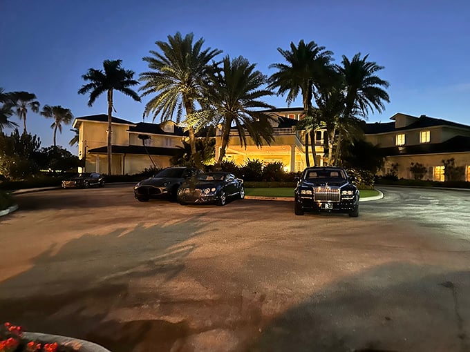 Palm Beach elegance awaits at Flagler Steakhouse - where luxury cars outside hint at the opulence within.