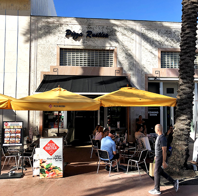 Pizza Rustica's Miami Beach spot comes with yellow umbrellas and prime people-watching&mdash;the perfect pizza theater experience.