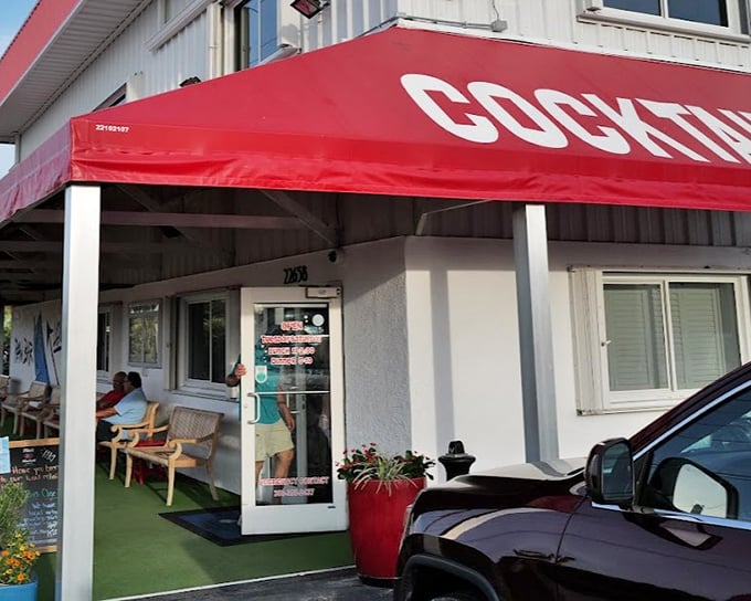 The Square Grouper's red awning welcomes weary travelers to a Keys oasis of seafood perfection.