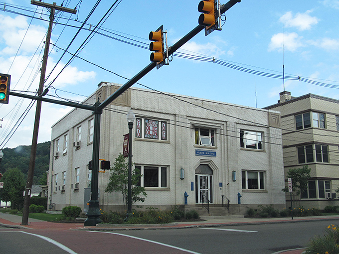 A historic white building stands at Bradford's crossroads, representing the town's blend of heritage and affordability that makes it perfect for Social Security recipients.