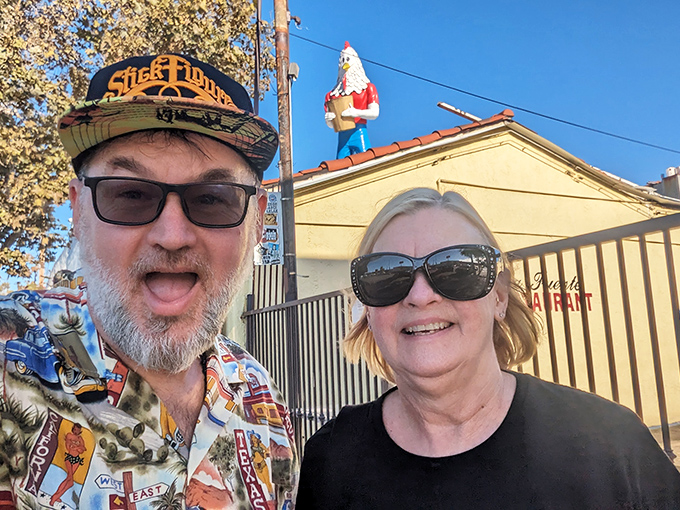 With his blank stare and bucket in hand, Chicken Boy stands as perhaps the strangest "Statue of Liberty" any city could claim.