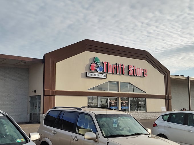 The warm tones of CommunityAid's facade hint at the welcoming atmosphere waiting for thrift enthusiasts inside.