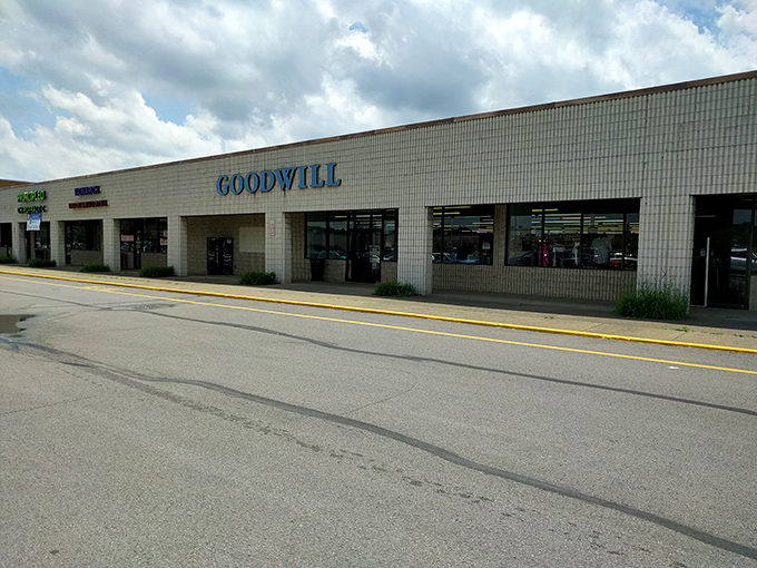 "Goodwill's no-frills exterior hides a labyrinth of possibilities. What treasures hide behind those unassuming windows?"