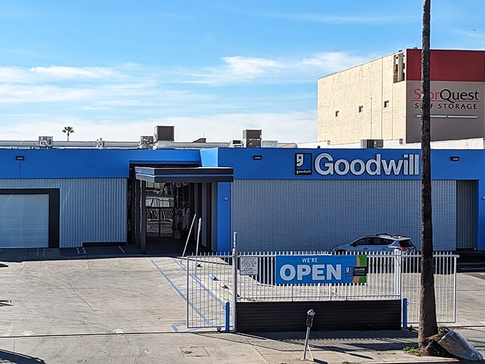 The "NOW OPEN" sign is the most beautiful phrase in the thrifter's vocabulary, promising fresh finds and untouched treasures.