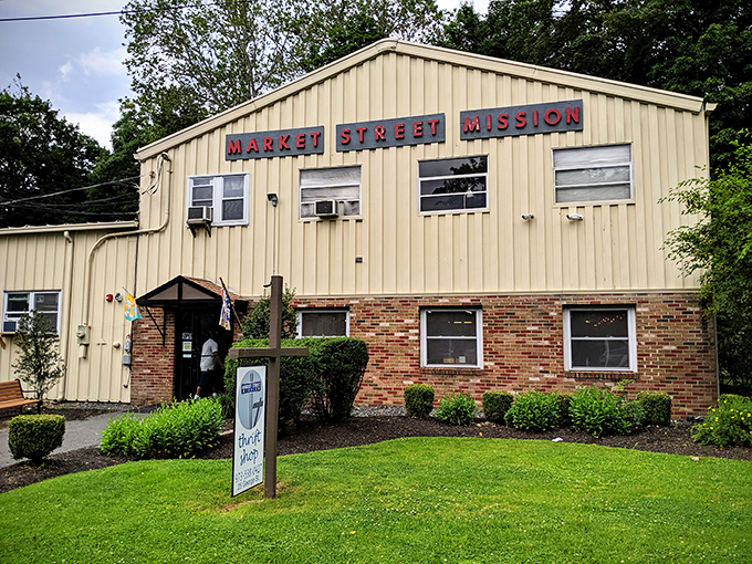 Where thrifting and purpose meet. That wooden sign points the way to guilt-free shopping. 