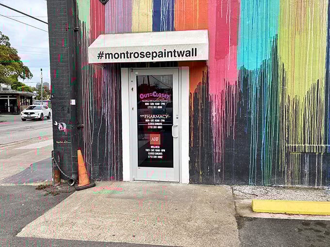 The dripping rainbow paint and bright pink windows signal this isn't your average thrift experience &ndash; it's a statement.