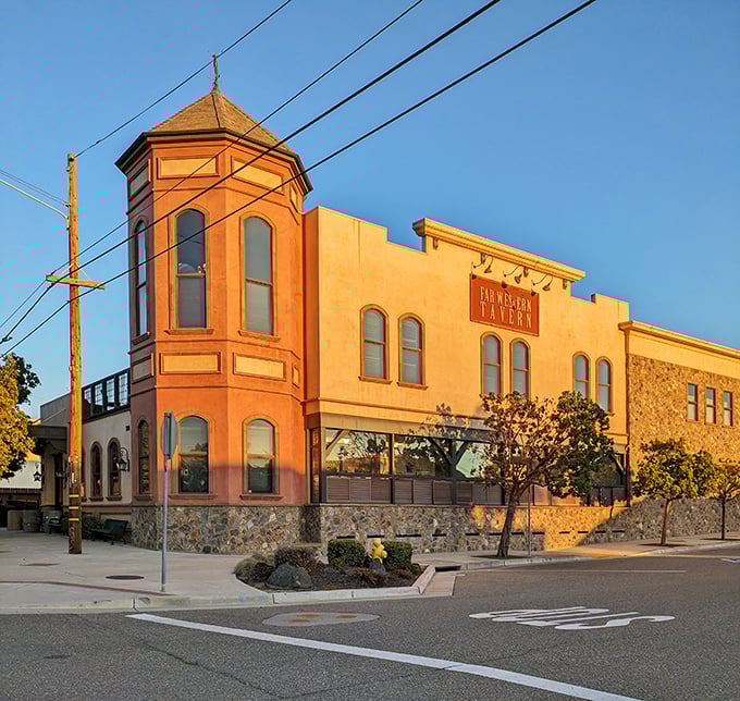 Golden hour bathes this historic building in warm light. Inside, oak-fired grills keep a California tradition alive.