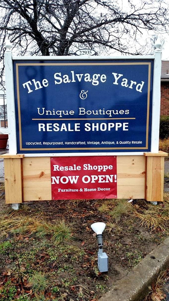 This unassuming sign for The Salvage Yard hints at hidden treasures within. Like a secret password to a world of unique finds and repurposed wonders.