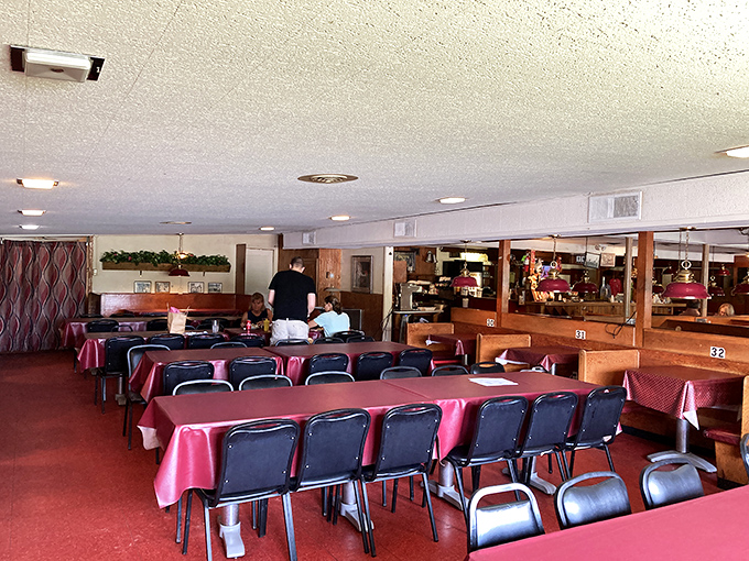 Red tablecloths and practical chairs speak volumes &ndash; this place prioritizes what matters: bringing people together over exceptional food.