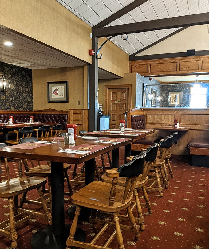 Wooden chairs, warm tones, and tables set for memories. The kind of place where "meeting for a quick bite" turns into three hours of conversation.