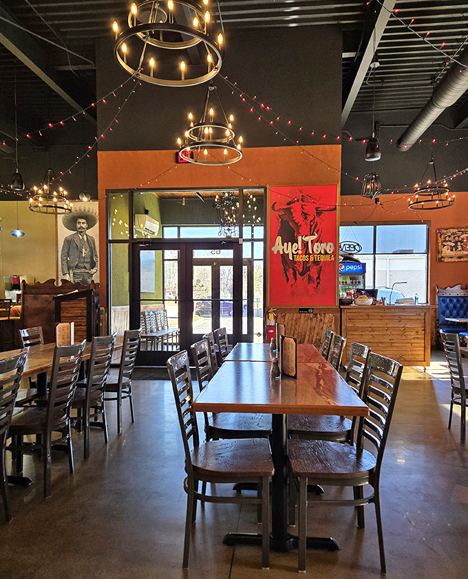 Red accents, wooden tables, and that striking bull logo – the dining room manages to feel both spacious and intimate at the same time.