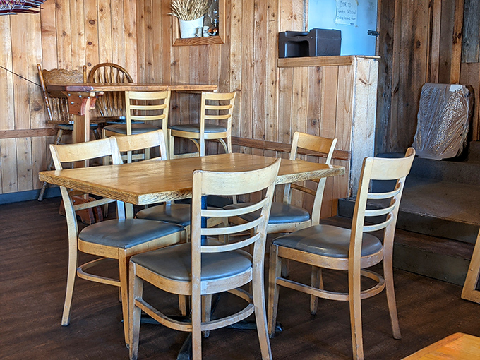 Wooden chairs and tables arranged with care&mdash;not for Instagram, but for actual humans to gather, eat, and share stories.