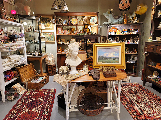Classical busts meet vintage textiles in this vignette that could inspire an interior designer or simply someone looking to add character to a cookie-cutter apartment.