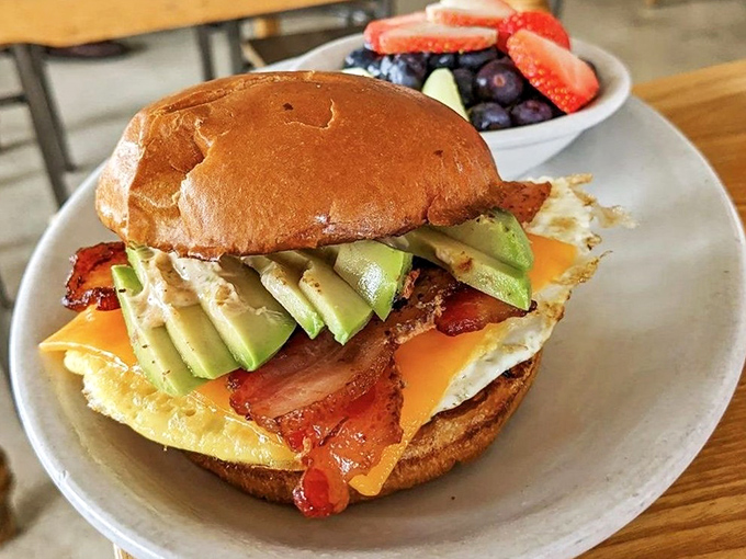This breakfast sandwich stacks avocado, bacon, and egg with the architectural precision of Frank Lloyd Wright, but with better flavor.