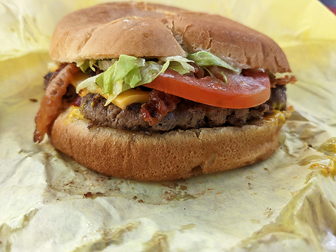 A burger that doesn't need fancy aioli or artisanal buns &ndash; just honest ingredients stacked with the precision of a roadside masterpiece.